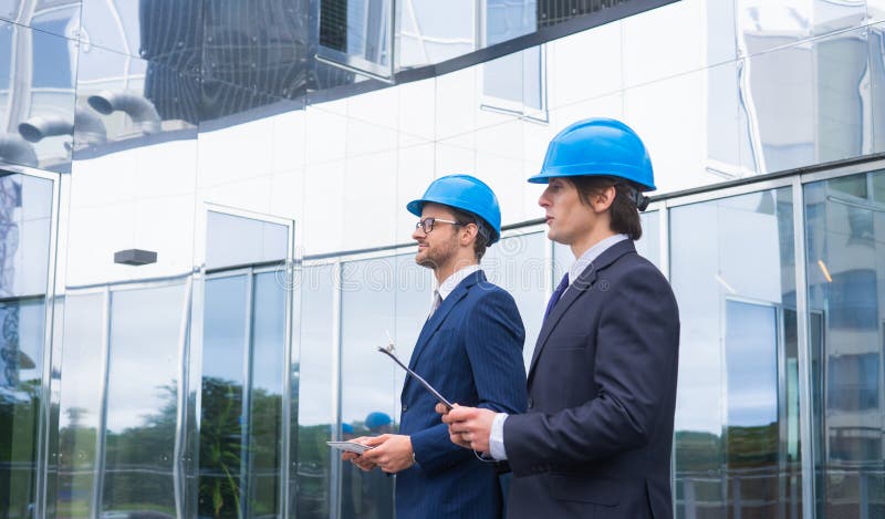 Real Estate Developers in Helmets. New Office Construction Stock Image ...