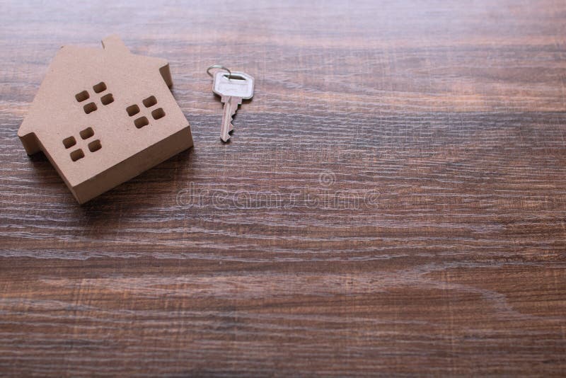 Real Estate with House Model and Key on Wood Table Stock Photo - Image ...