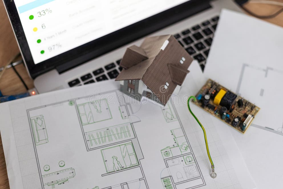 A Real Estate Model and a Computer are on the Table. Stock Image ...