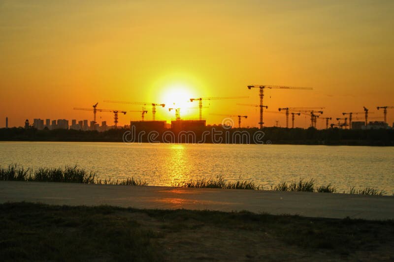 A Real Estate Project Under Construction Under the Sunset Stock Photo ...