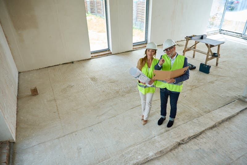 Real Estate Sales Manager Communicates with Foreman Stock Image - Image ...