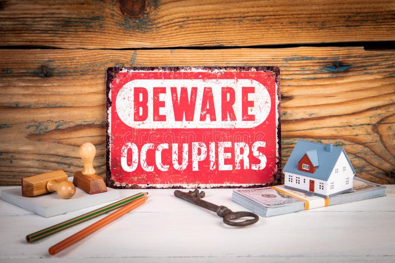 Real Estate Security Concept with Beware Occupiers Warning Sign and ...