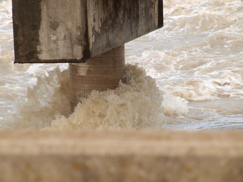 Real Fury Wraps Itself Around the Column of the Footbridge at the ...