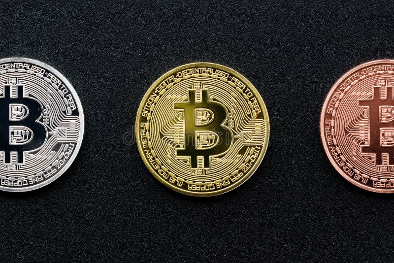 3 Real Gold Bronze and Silver Metal Bitcoin Isolated on Black ...