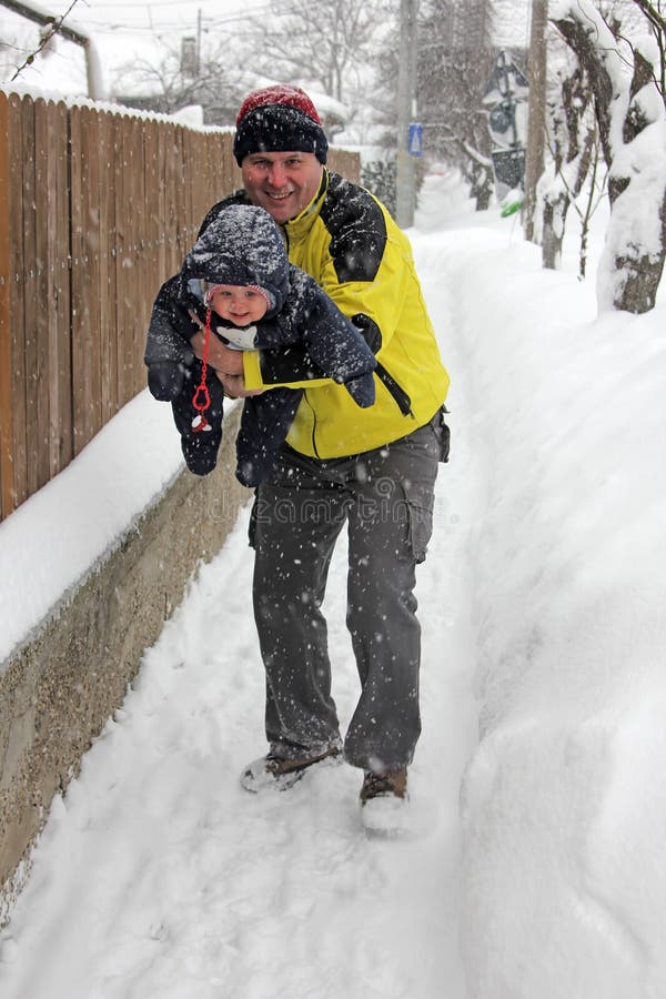 Real Life - Playing with My Dad in Snow Stock Image - Image of girl ...
