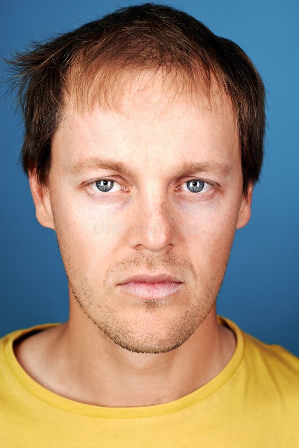Real man face stock image. Image of masculine, serious - 33714207