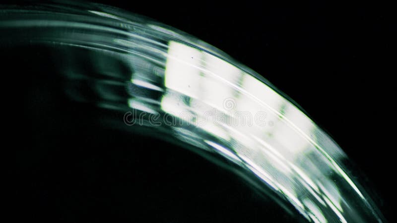 Real Reflections and Lens Flares Shot through the Glass Over Black ...