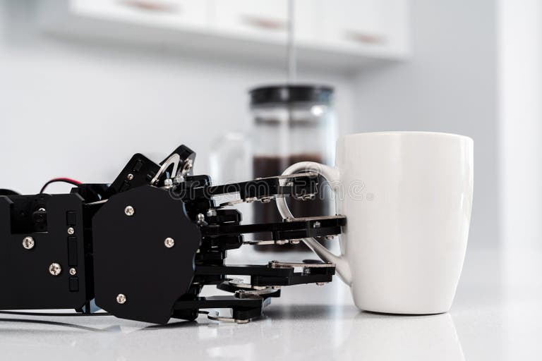 Real Robot Hand and White Cup of Coffee. Concept of Robotic Process ...