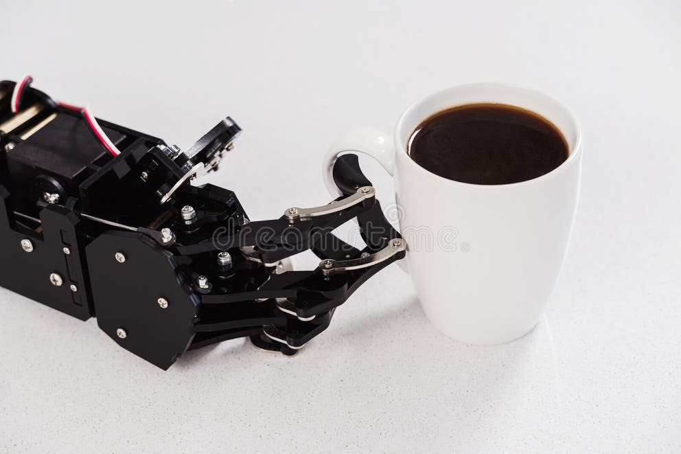 Real Robot Hand and White Cup of Coffee. Concept of Robotic Process ...
