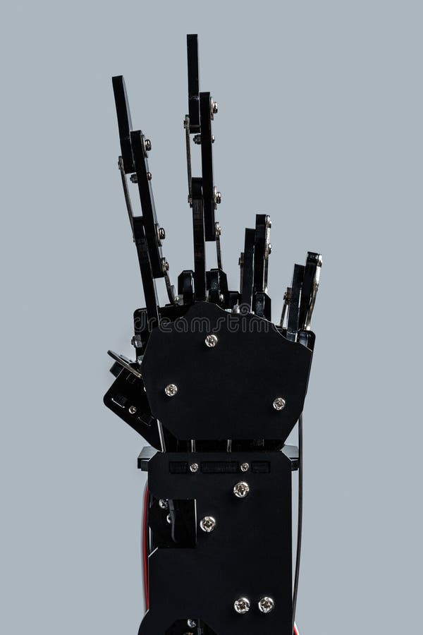 Real Robotic Hand Giving V Sign Against Gray Background Stock Photo ...