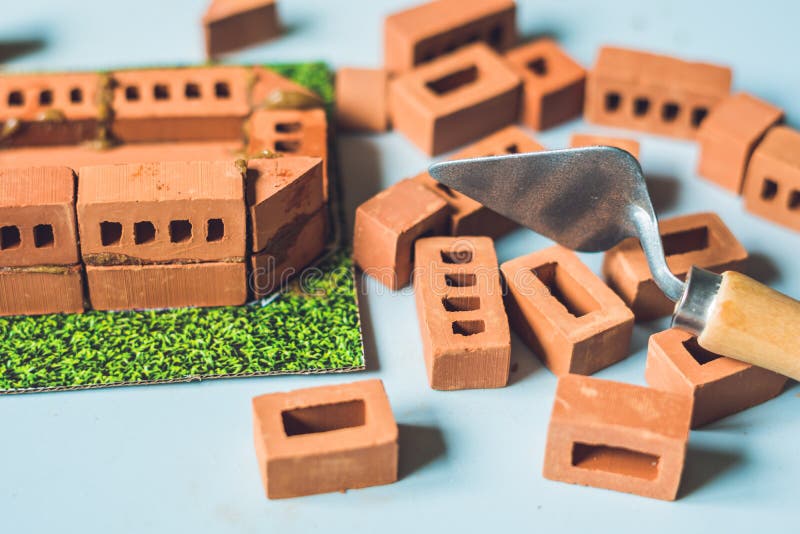 Real Small Clay Bricks at the Table. Early Learning. Developing Toys ...