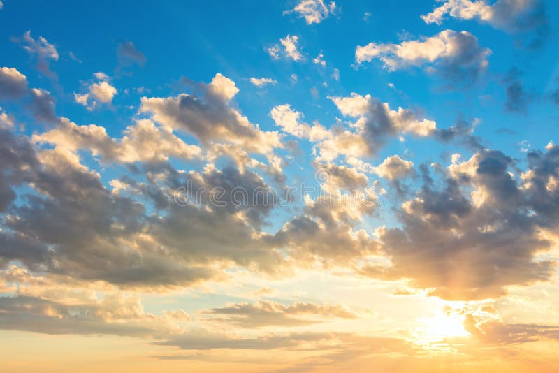 Real Sunrise Sky with Beautiful Light Clouds, Sun and Sunbeams Stock ...