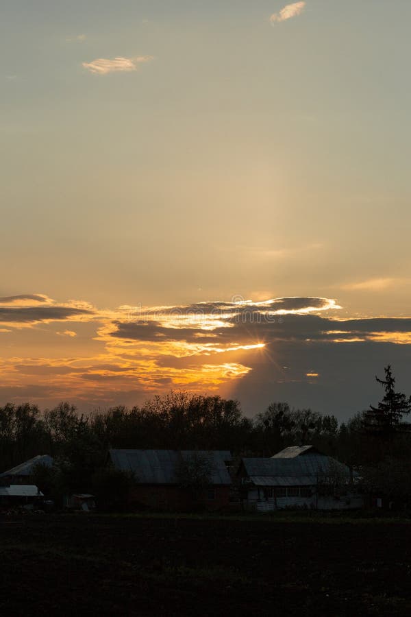 A Real Sunset Sky with Beautiful Light Clouds and Sun Rays, without ...