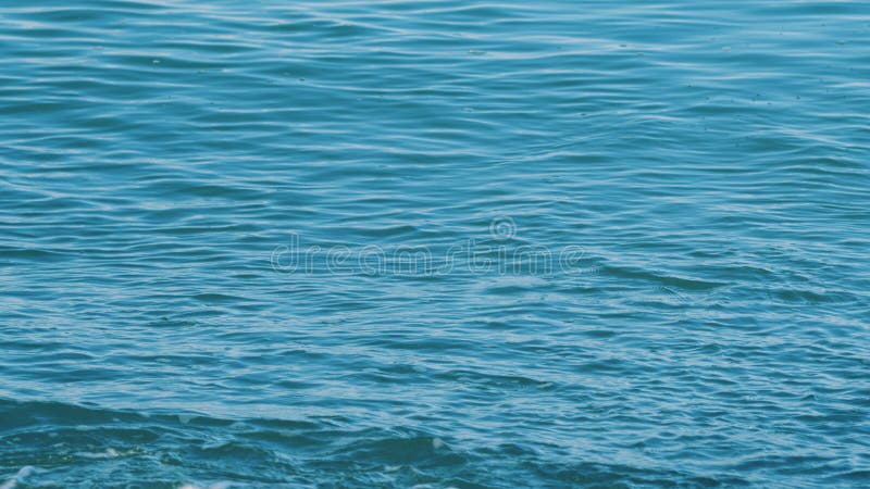 Blue Sea Water in Calm. Beautiful Wave Pattern in Sea. Still Calm Sea ...