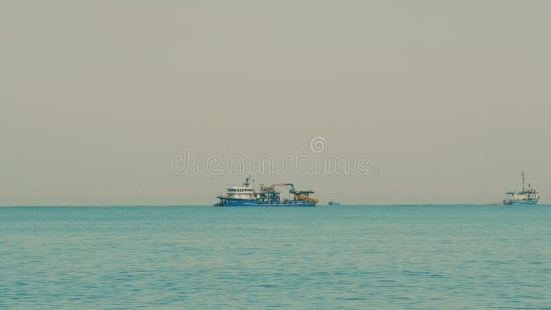 Fishing Boat Sails for Fishing. Fishing Boat in the Middle of the Sea ...