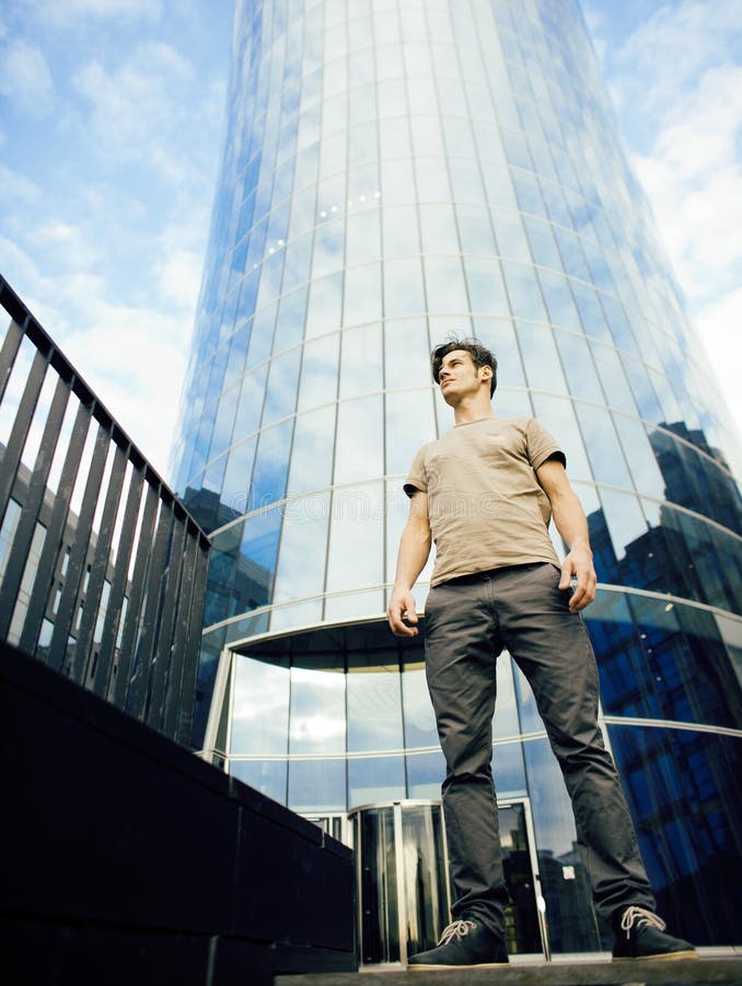 Real Young Man Stand in Front of Modern Business Building Stock Image ...
