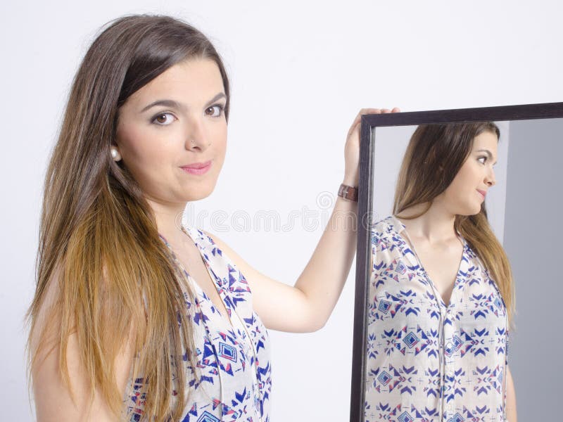 Real Young Woman Looking in a Mirror Stock Image - Image of happiness ...