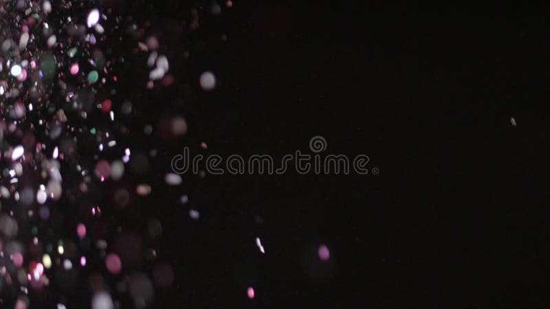 Realistic Glitter Exploding on Black Background. Stock Image - Image of ...