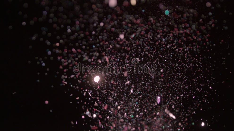 Realistic Glitter Exploding on Black Background. Stock Photo - Image of ...