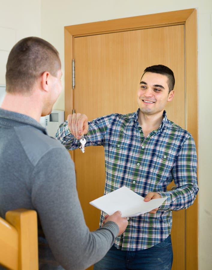 Realtor Giving Keys To Flat Owner Stock Photo - Image of agreement ...
