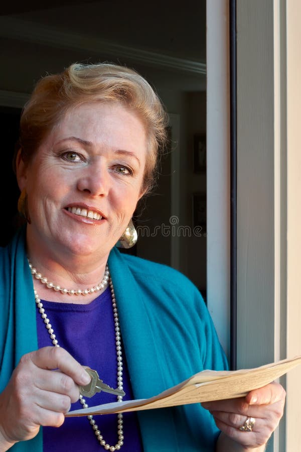 Realtor with Key and Listing Stock Photo - Image of broker, open: 21234796