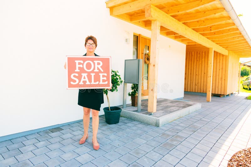 Realtor Selling a House stock photo. Image of woman, white - 85091232