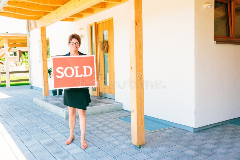 Realtor Selling a House stock image. Image of female - 101423131