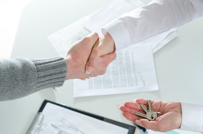 Realtor Shaking Hands with Her Client Stock Photo - Image of agent ...