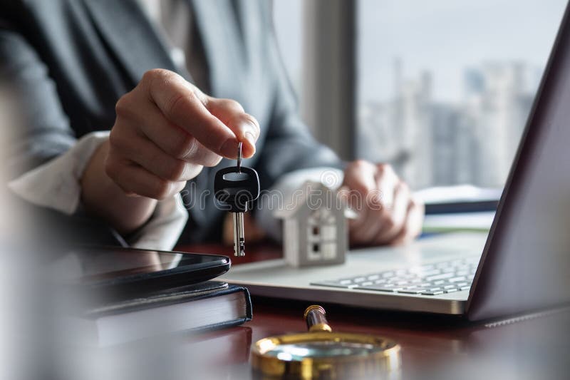 Realtor Showing Apartment Key at Desk Stock Image - Image of architect ...