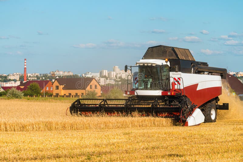 Reaping Machine in the Suburb Stock Photo - Image of city, field: 177983080