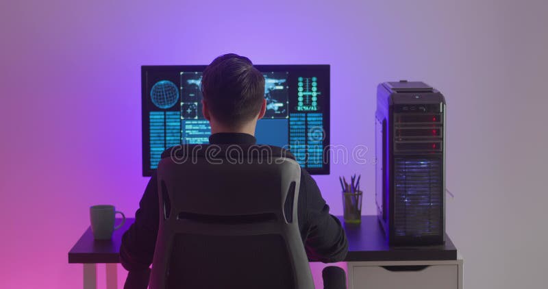 Rear View Of Man Programmer Working At Computer Male Hacker Coding Typing Code On Pc At Office