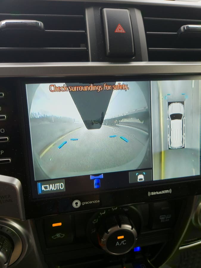 Rear Camera Display Showing Vehicle Surroundings on a Highway during ...
