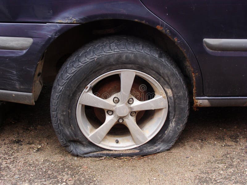 Flat tire 2 stock photo. Image of tire, rear, tyre, wheel - 169386572