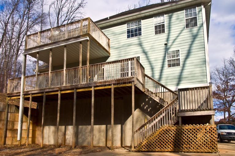 Rear Decks on a House stock image. Image of concrete - 12737255
