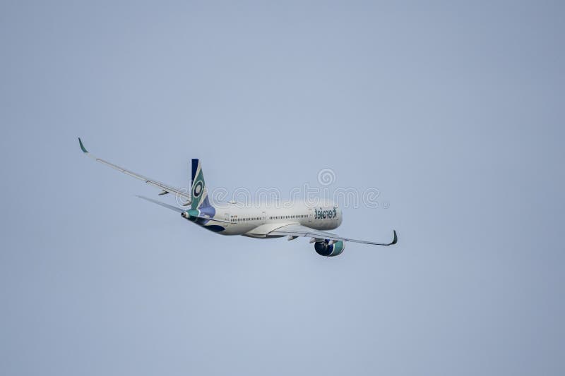 Rear Image of an Airplane Turning in the Sky To Head Towards Its ...
