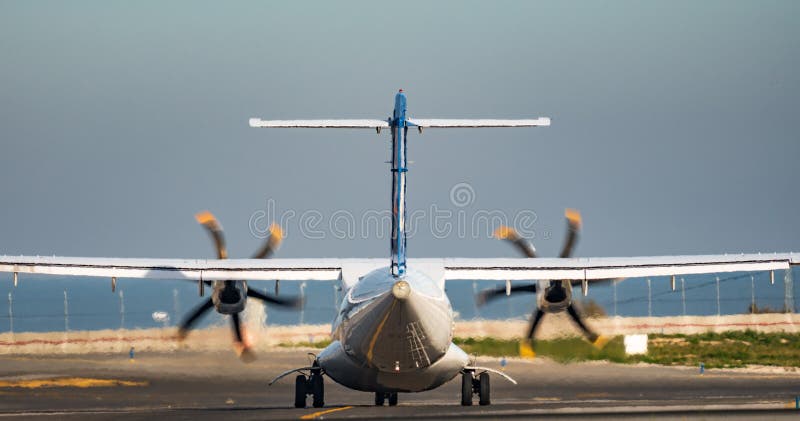 Rear View of Propeller Plane in the Runway Stock Photo - Image of ...