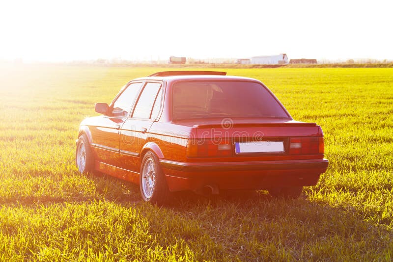 The Rear of the Old, Red, German Car that Stands on the Grass during ...