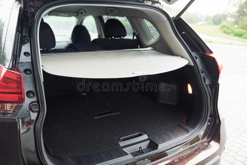Rear Particle View of Modern Black Automobile with Car Trunk Open Stock ...
