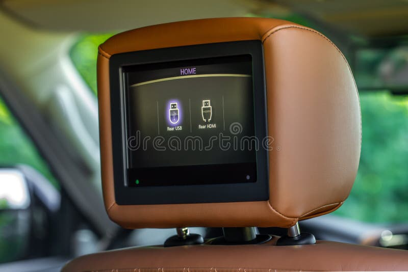 Rear Seat Screen. TV for Passenger Inside a Modern Car Stock Photo ...