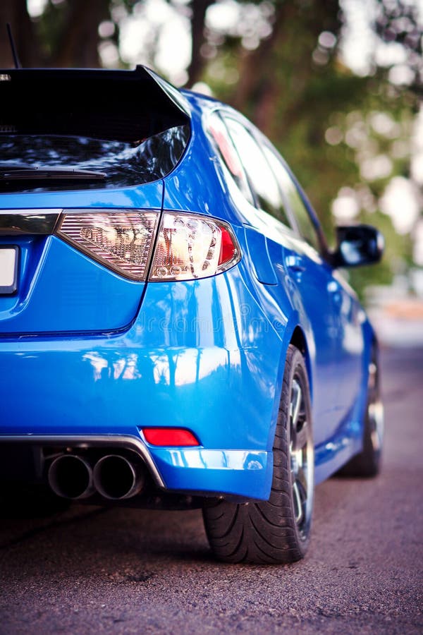 Rear Side View of Blue Sport Car Stock Image - Image of bokeh, chrome ...