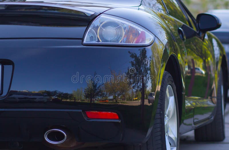 Rear-side View of a Luxury Car with Natural Reflection Nature Stock ...
