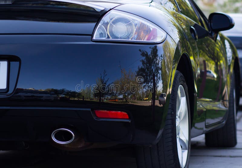 Rear-side View of a Luxury Car with Natural Reflection Nature Stock ...