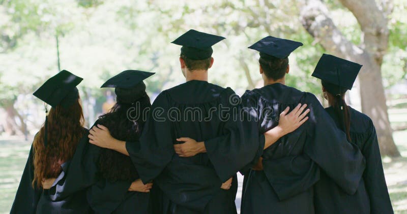 Rear of Students Standing Together at Graduation. Group of Successful ...
