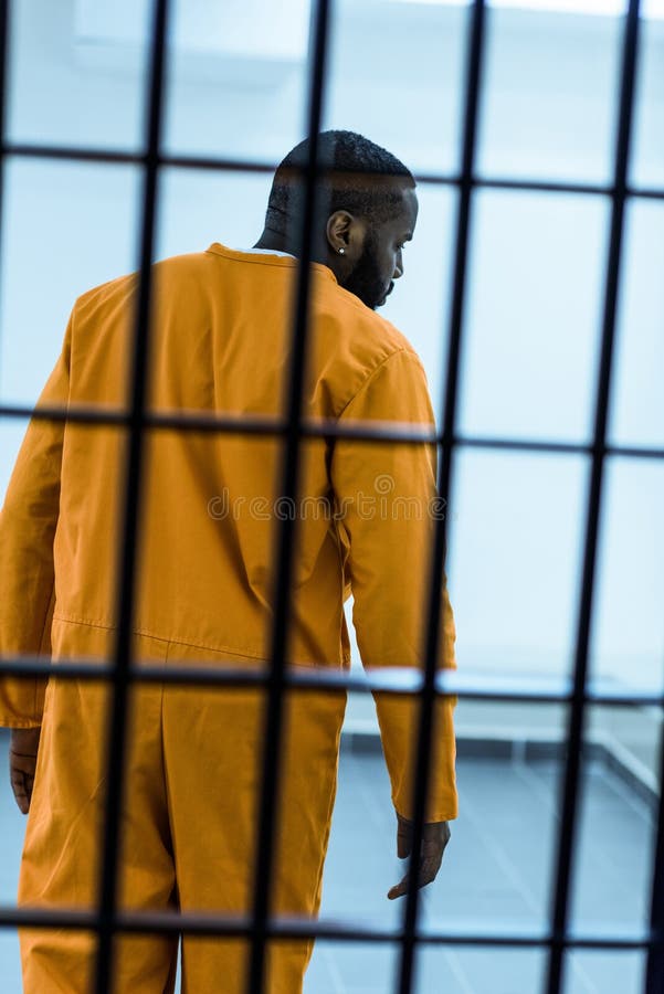 Rear View of African American Prisoner Behind Stock Photo - Image of ...