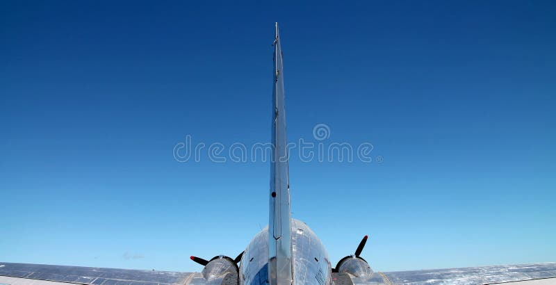 Rear View of Aircraft in Flight Stock Image - Image of closeup, winged ...