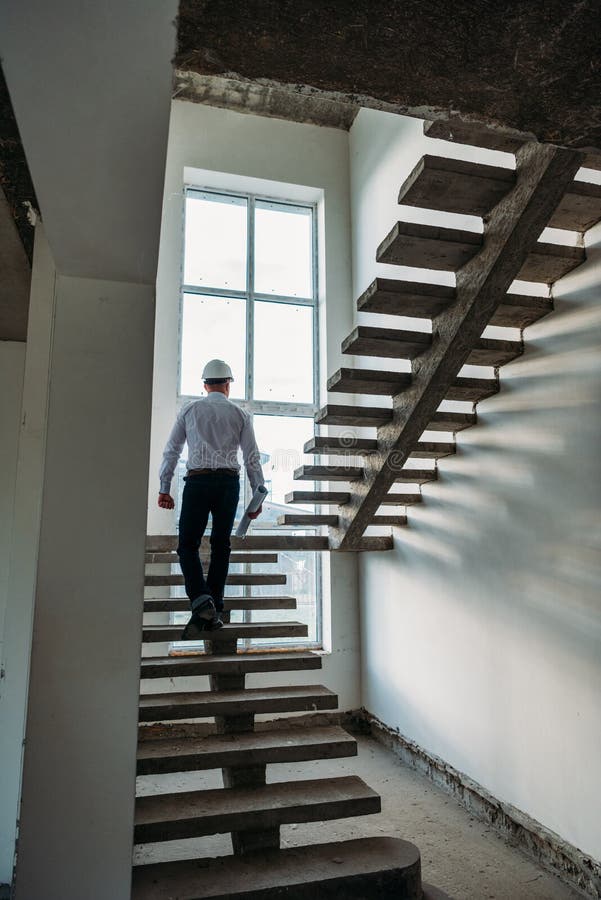 Rear View of Architect Going Upstairs Inside of Stock Image - Image of ...