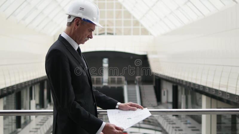 Rear View of Architect Looking Comparing Housing Project with Building ...