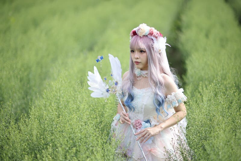 Rear View of Asian Woman Wearing White Lolita Dress in Green Flowers ... Rear View of Asian Woman Wearing White Lolita Dress in Green Flowers ...