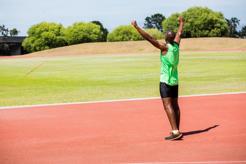 Rear View of Athlete Posing after Victory Stock Photo - Image of ...