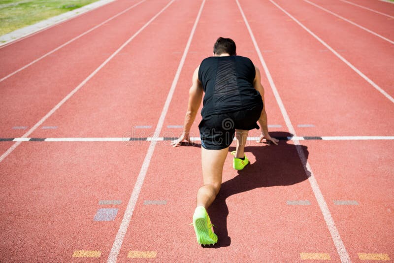 Rear View of an Athlete Ready To Run Stock Image - Image of runner ...